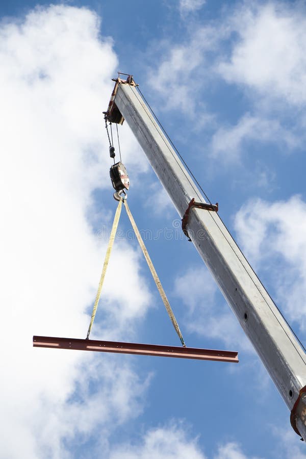 Construction Crane with a Hook and a Large Steel Industrial Spike ...