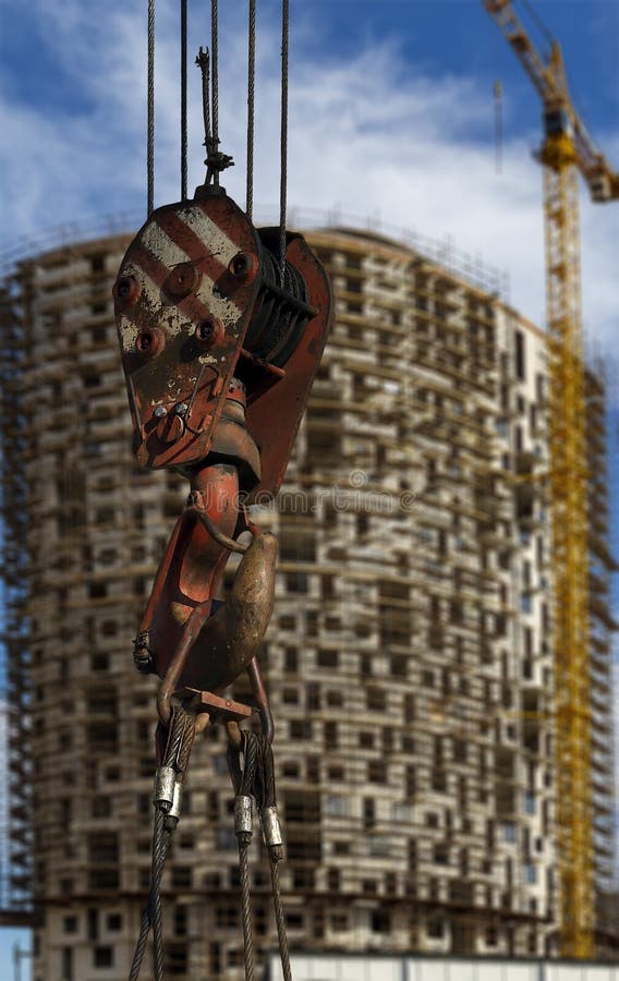 Construction Crane Hook with Multi-storey Building Under Construction ...
