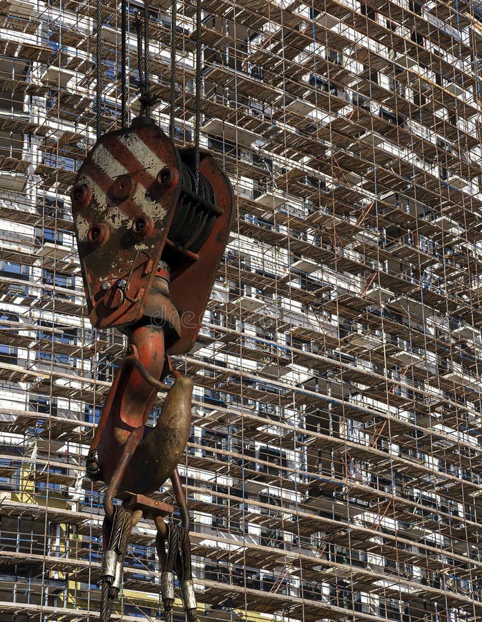 Construction Crane Hook with Multi-storey Building Under Construction ...