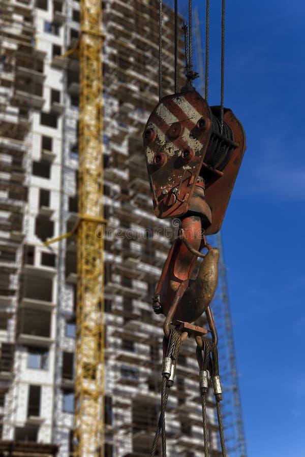 Construction Crane Hook with Multi-storey Building Under Construction ...