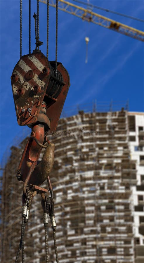 Construction Crane Hook with Multi-storey Building Under Construction ...