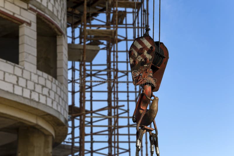 Construction Crane Hook with Multi-storey Building Under Construction ...
