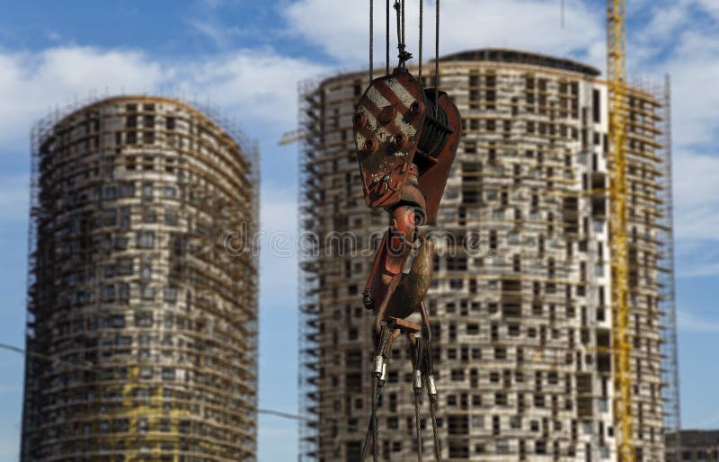 Construction Crane Hook with Multi-storey Building Under Construction ...