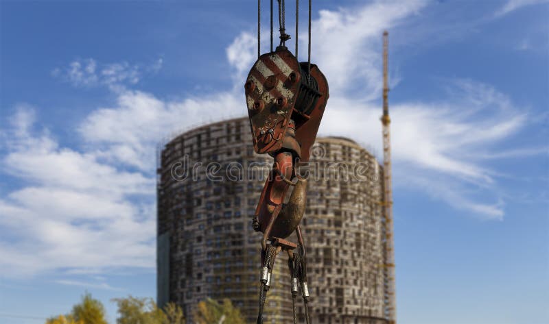 Construction Crane Hook with Multi-storey Building Under Construction ...
