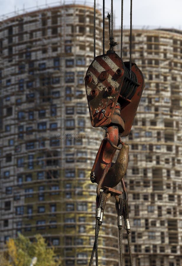 Construction Crane Hook with Multi-storey Building Under Construction ...