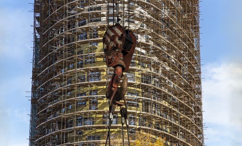 Construction Crane Hook with Multi-storey Building Under Construction ...