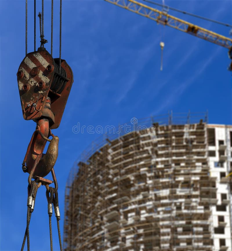 Construction Crane Hook with Multi-storey Building Under Construction ...