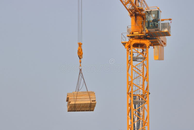 Construction Crane and Load Stock Photo - Image of action, outside ...