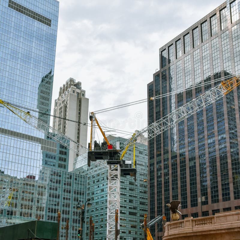 Construction Crane in the Middle of Modern Buildings. Nyc, USA Stock ...
