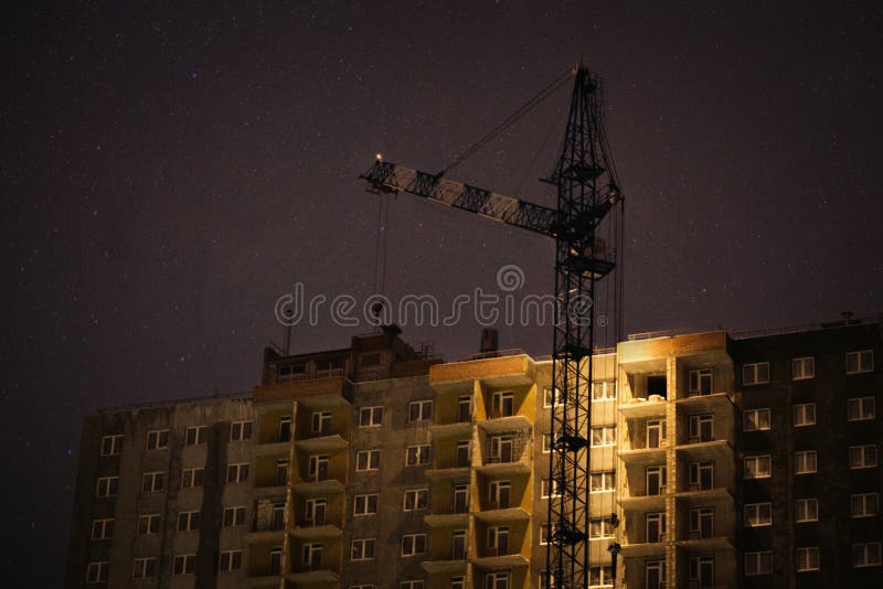 Construction Crane at Night Stock Photo - Image of development, tower ...