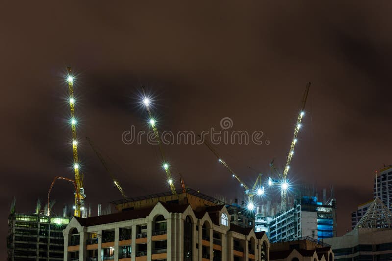 Construction Crane at Night Stock Photo - Image of city, dark: 96671730