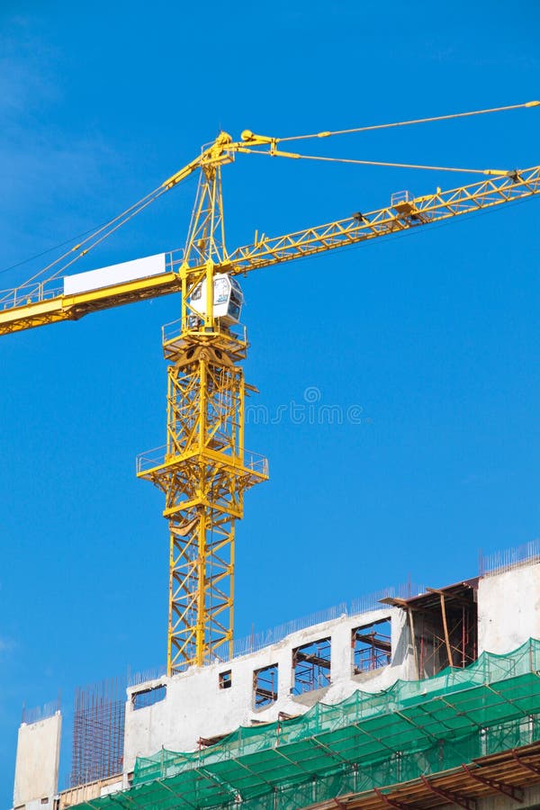 Construction Crane Over Blue Sky. Stock Photo - Image of highrise, blue ...