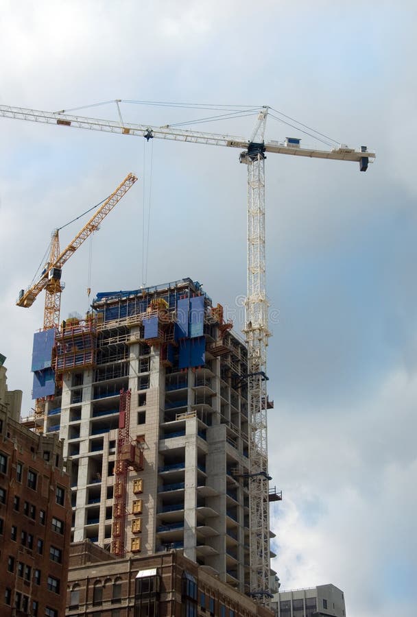 Construction Crane on Skyscraper Stock Image - Image of operator, high ...