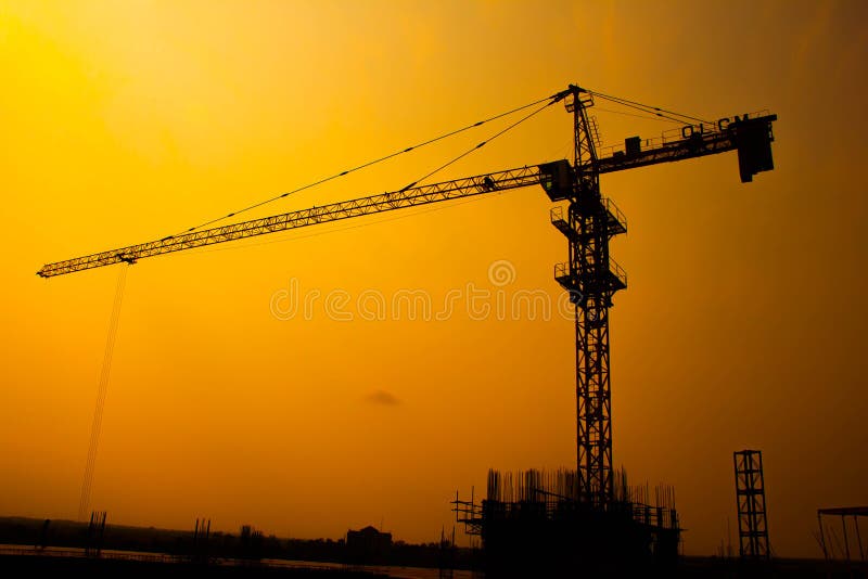 The Construction Crane on Sunset Stock Photo - Image of building ...