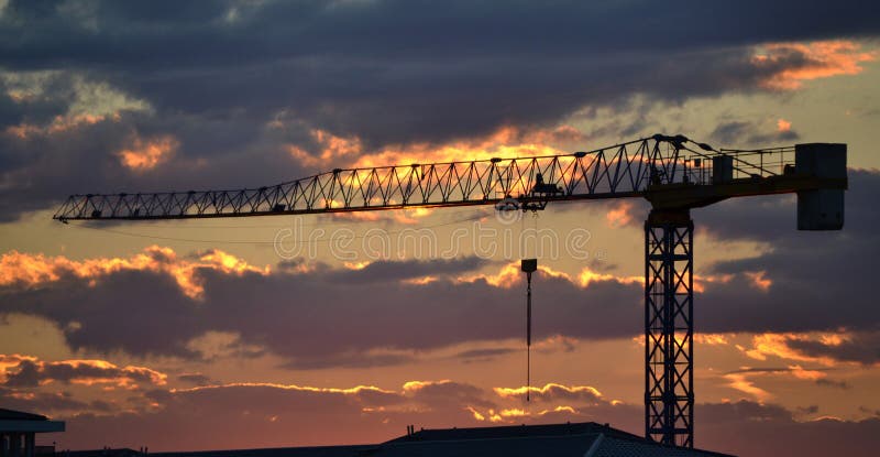 Construction Crane at Sunset Stock Image - Image of equipment, sunrise ...