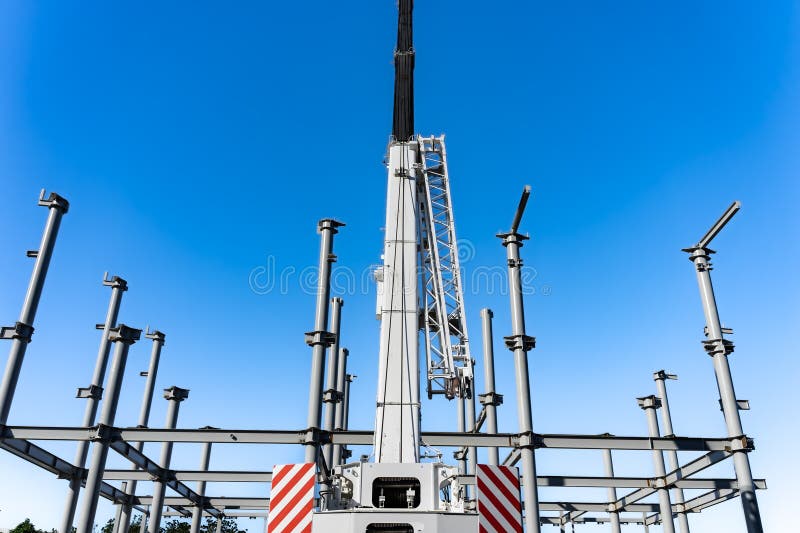 Construction Crane Towering Over Structural Steel Framing Stock Image ...