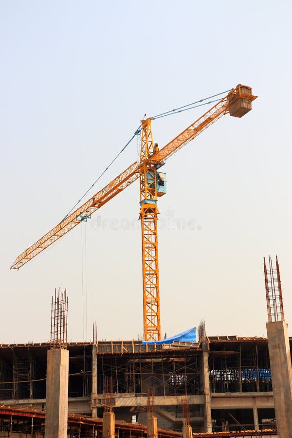 Construction crane at work stock photo. Image of site - 51217042