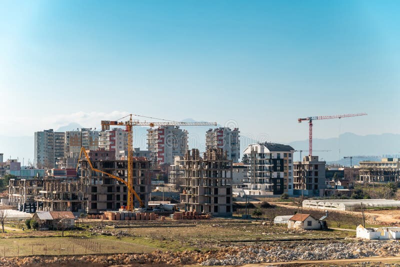 Construction Crane Working on Large Construction Site Stock Photo ... Construction Crane Working on Large Construction Site Stock Photo ...