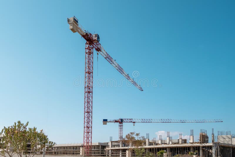 Construction Crane Working on Large Construction Site Stock Photo ...