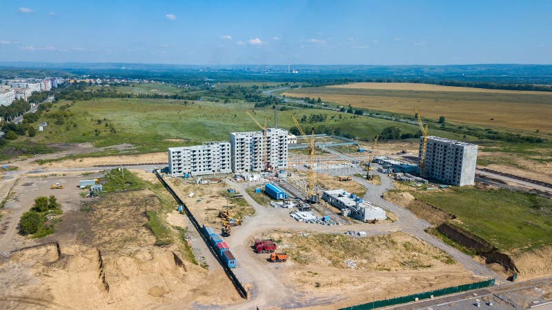 Construction Crane Works on the Construction of a Residential House ...