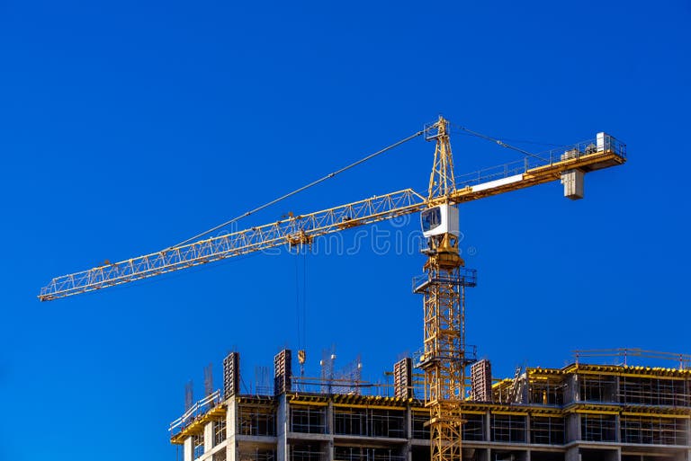 Construction Cranes are Building a House.construction Cranes are ...