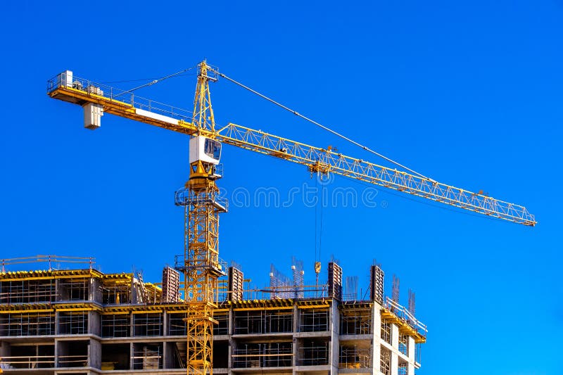 Construction Cranes are Building a House.construction Cranes. Stock ...