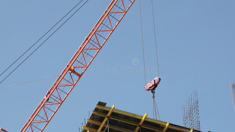 Construction Cranes Move Building Materials and Work on the ...