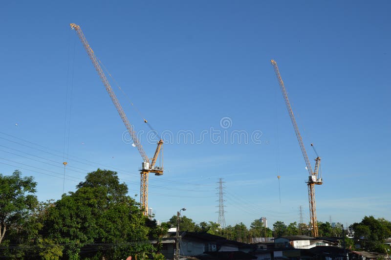 Working Building Cranes by the Canal Stock Photo - Image of tall ...