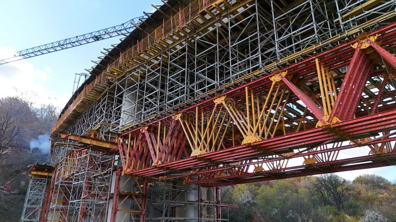 The Construction Cranes are Supporting the Bridge Construction To ...