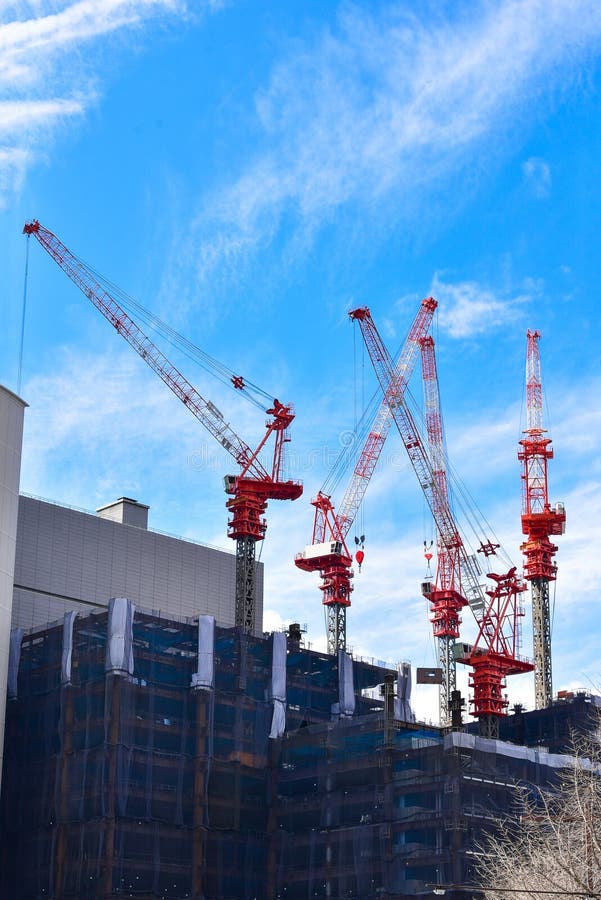 Construction Cranes on Top of Building Stock Image - Image of rise ...