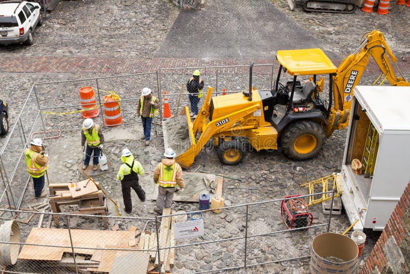Construction Crew Working On The Roof Sheeting Of New House Made With ...