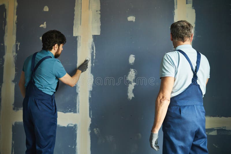 Construction Crew at Work stock image. Image of redecoration - 172812661
