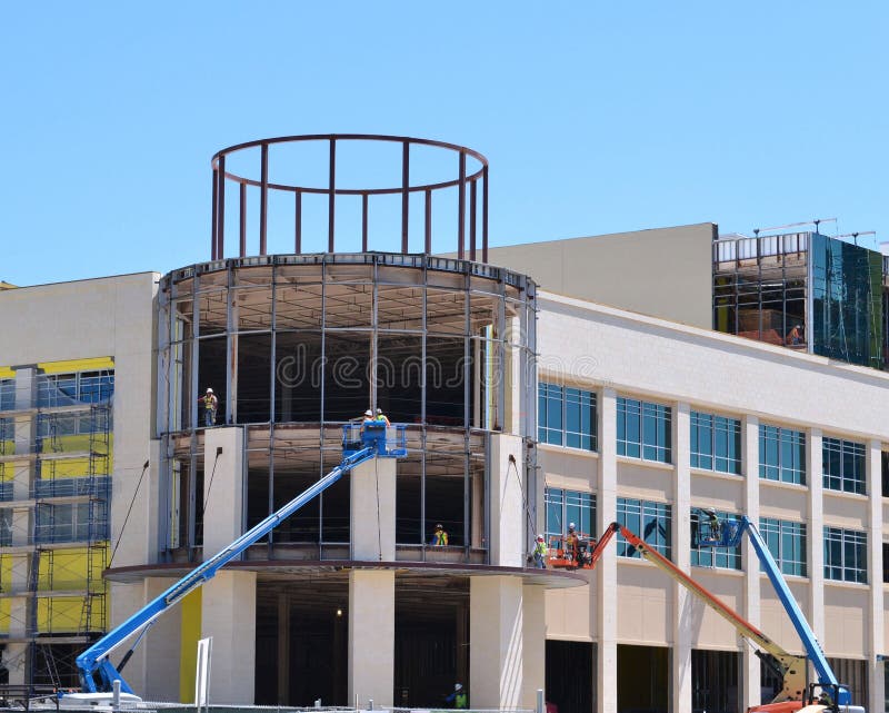 Construction Crews Work on a New Building Stock Photo - Image of ...