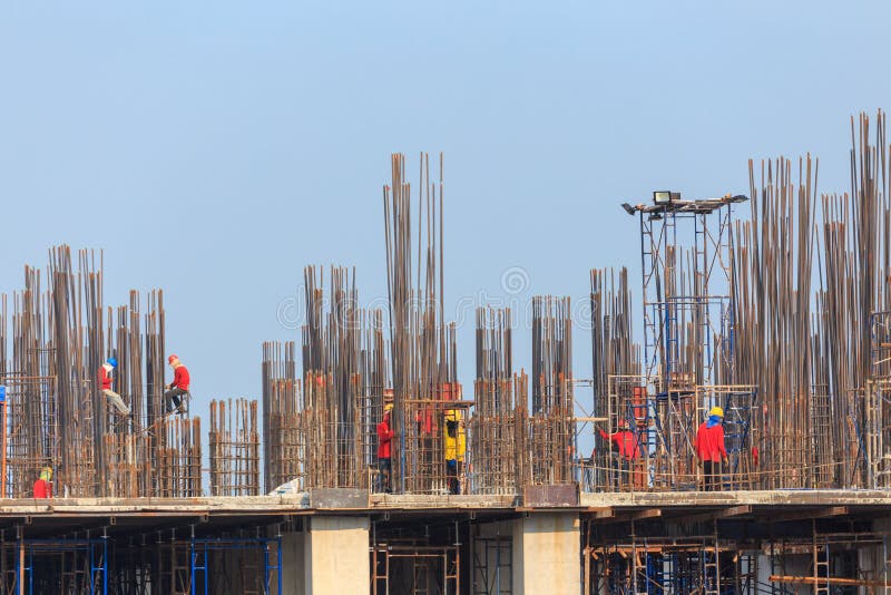 Construction Crews Working on High Ground Heavy Industry and Safety ...