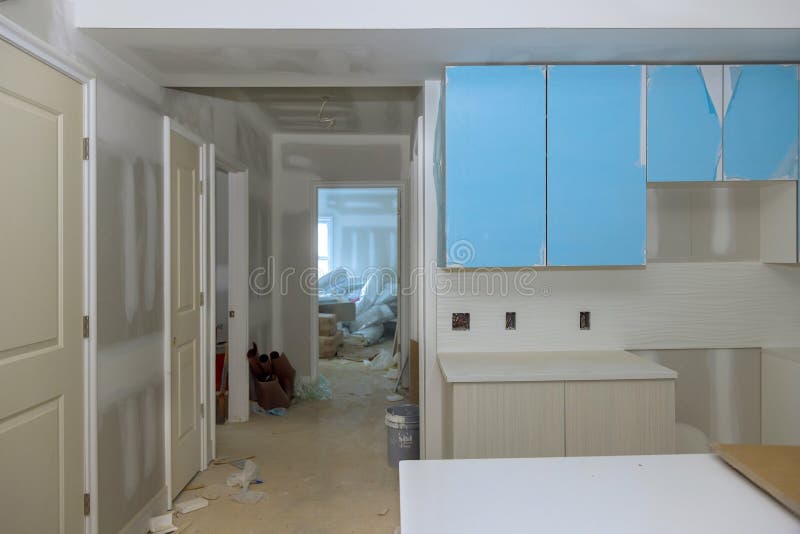 Construction of Custom Modular Kitchen Cabinets in a New House Stock ...