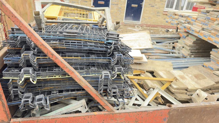 Construction Debris and Material Recovery in Skip Stock Photo - Image ...