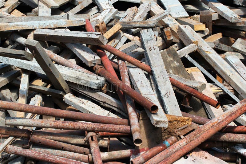 Construction Debris - Old Wooden Planks, Bars and Rusty Metal Pipes ...