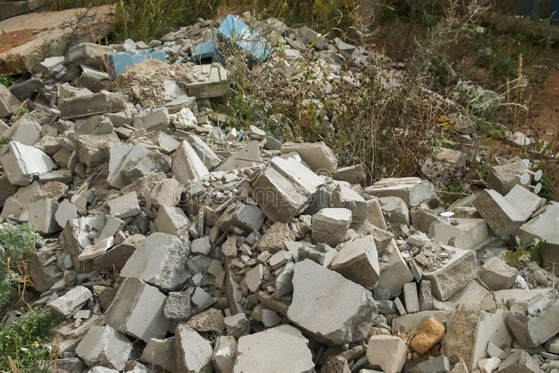 Construction Debris on Site with Broken Panels and Bricks, Closeup View ...