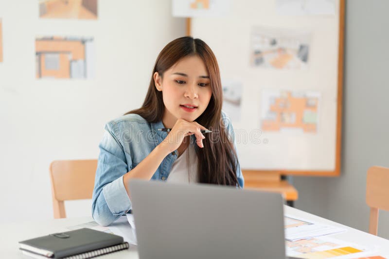 Construction Design Concept, Female Architect Working on Laptop To ...