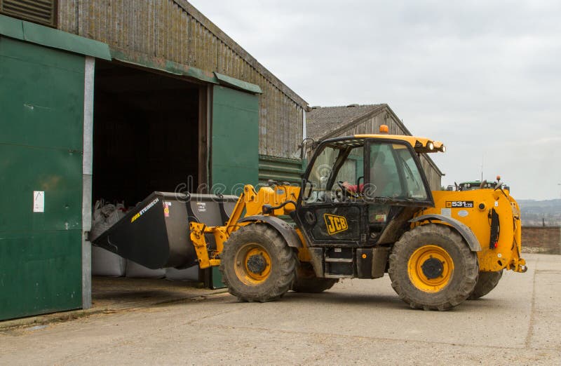 Construction Digger Loader in Farm Yard with Barn Editorial Image ...