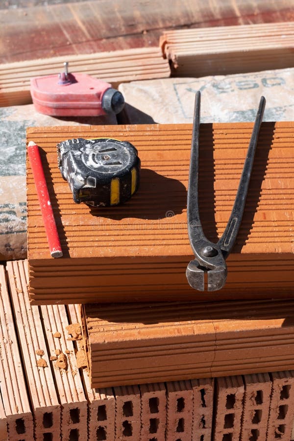 Various Masonry and Brickwork Tools Being Used on a Construction Site ...