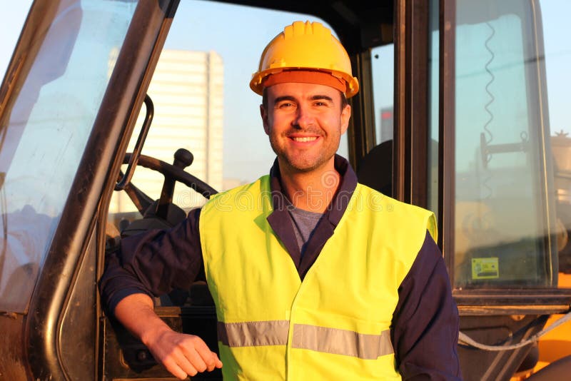 Construction Driver with Excavator on the Background Stock Photo ...