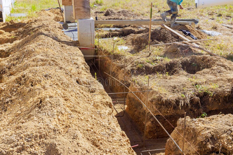 Construction an Earthen Trench the Foundation As Well As Pouring of a ...