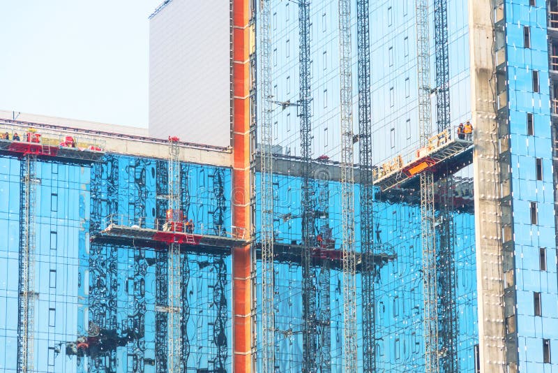 Construction Elevator Cradle for Finishing the External Facade of a ...