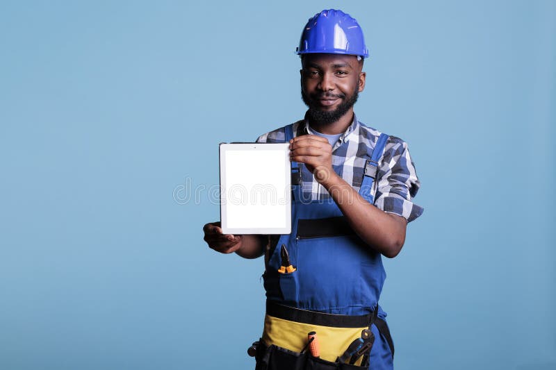 Construction Employee Holds Electronic Device Stock Photo - Image of ...