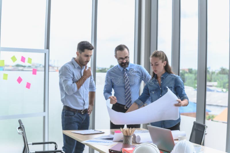 Construction Engineer and Architect Check Plan Working with the ...