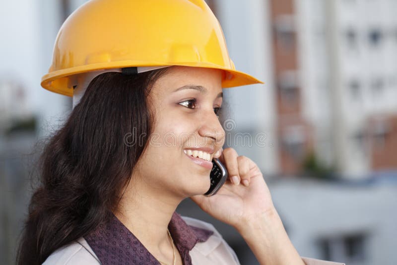 Engineer with cellphone stock photo. Image of person, isolated - 943056