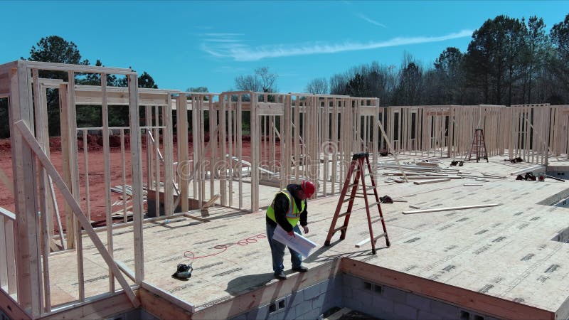 Construction Engineer Checking Quality Works of Wooden Frame Using ...