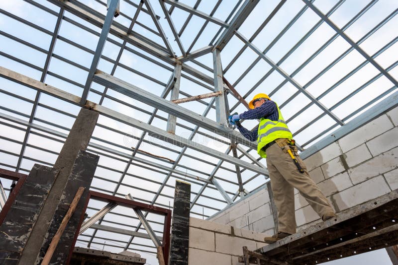 The Construction Engineer is Constructing the Steel Roof Structure of ...