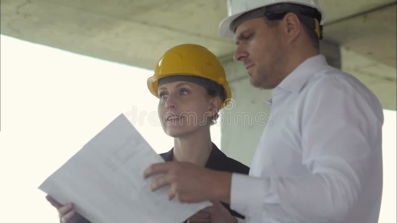 Construction Engineer Discussing Plan at Construction Site Stock Video ...
